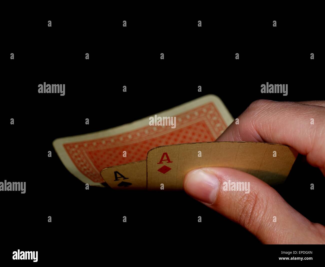 Ace pair in one hand Stock Photo - Alamy