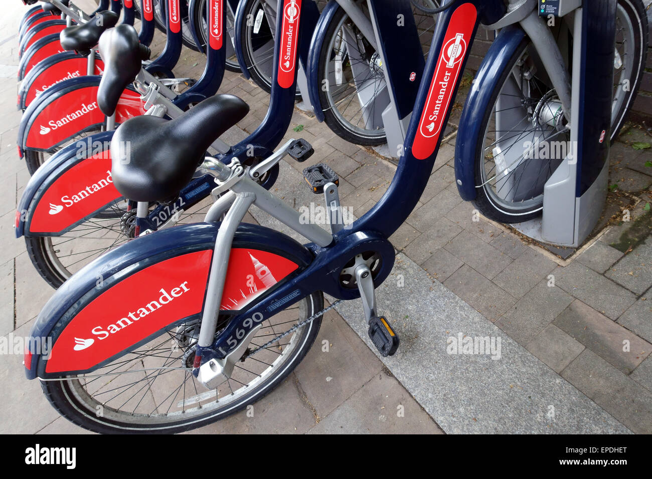 Santander Bank sponsored hire bicycles in docking station, London Stock ...