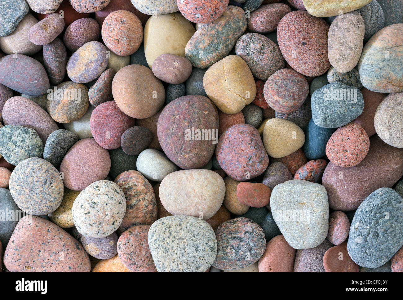 Sea stones background Stock Photo - Alamy