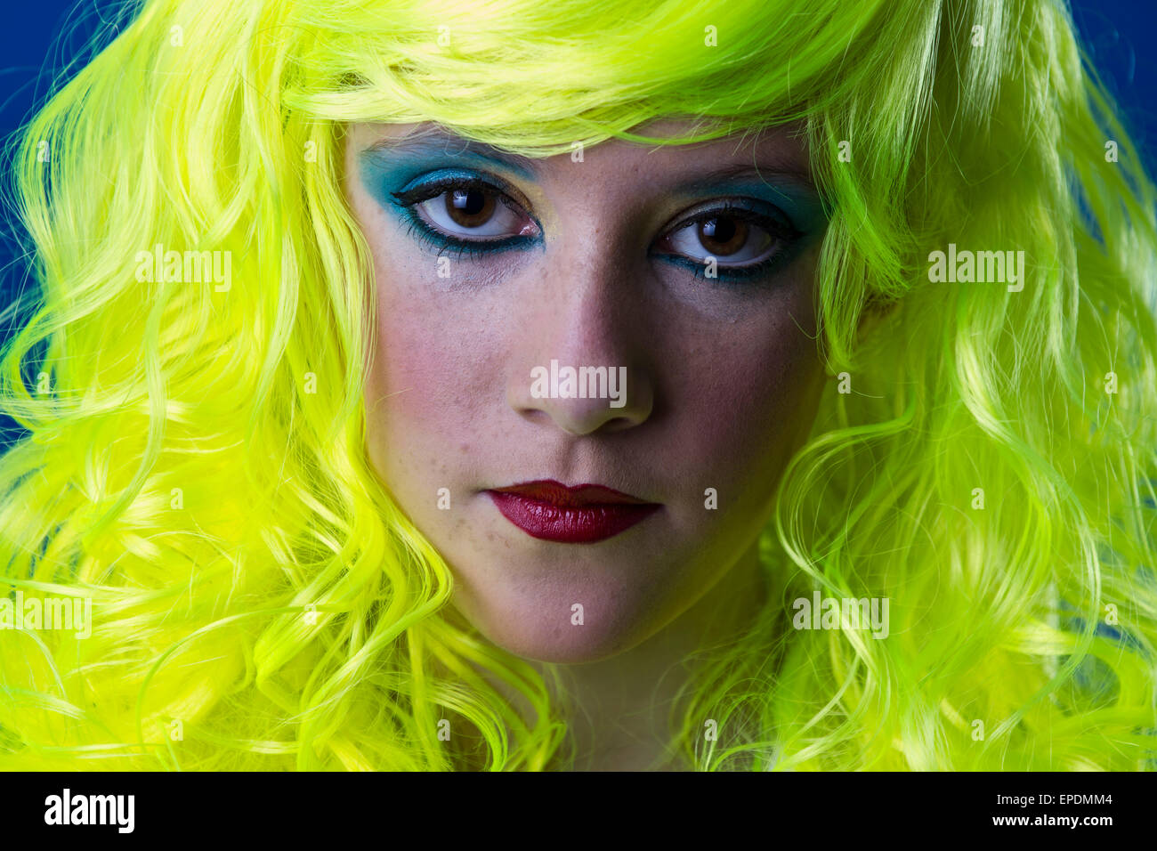Sad, young girl with yellow hair Stock Photo - Alamy