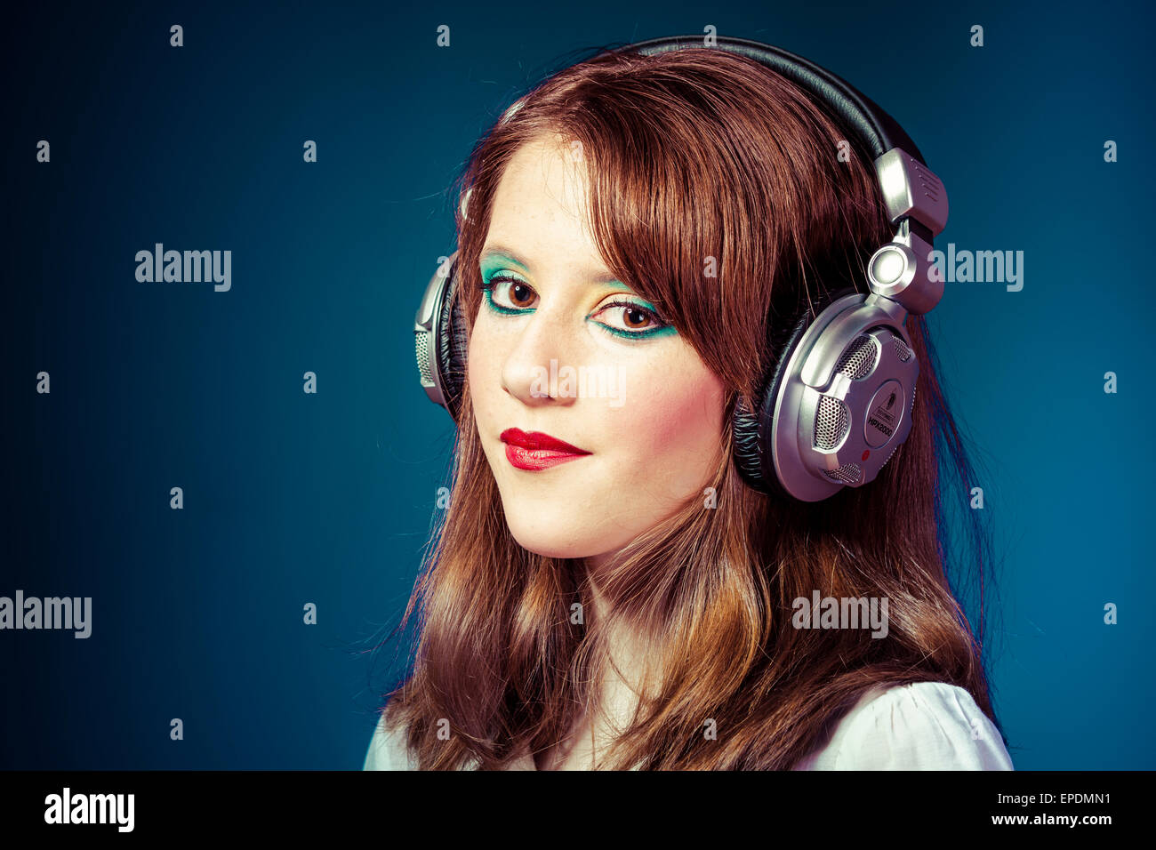 redhead teenager listening to rock music headphones Stock Photo - Alamy