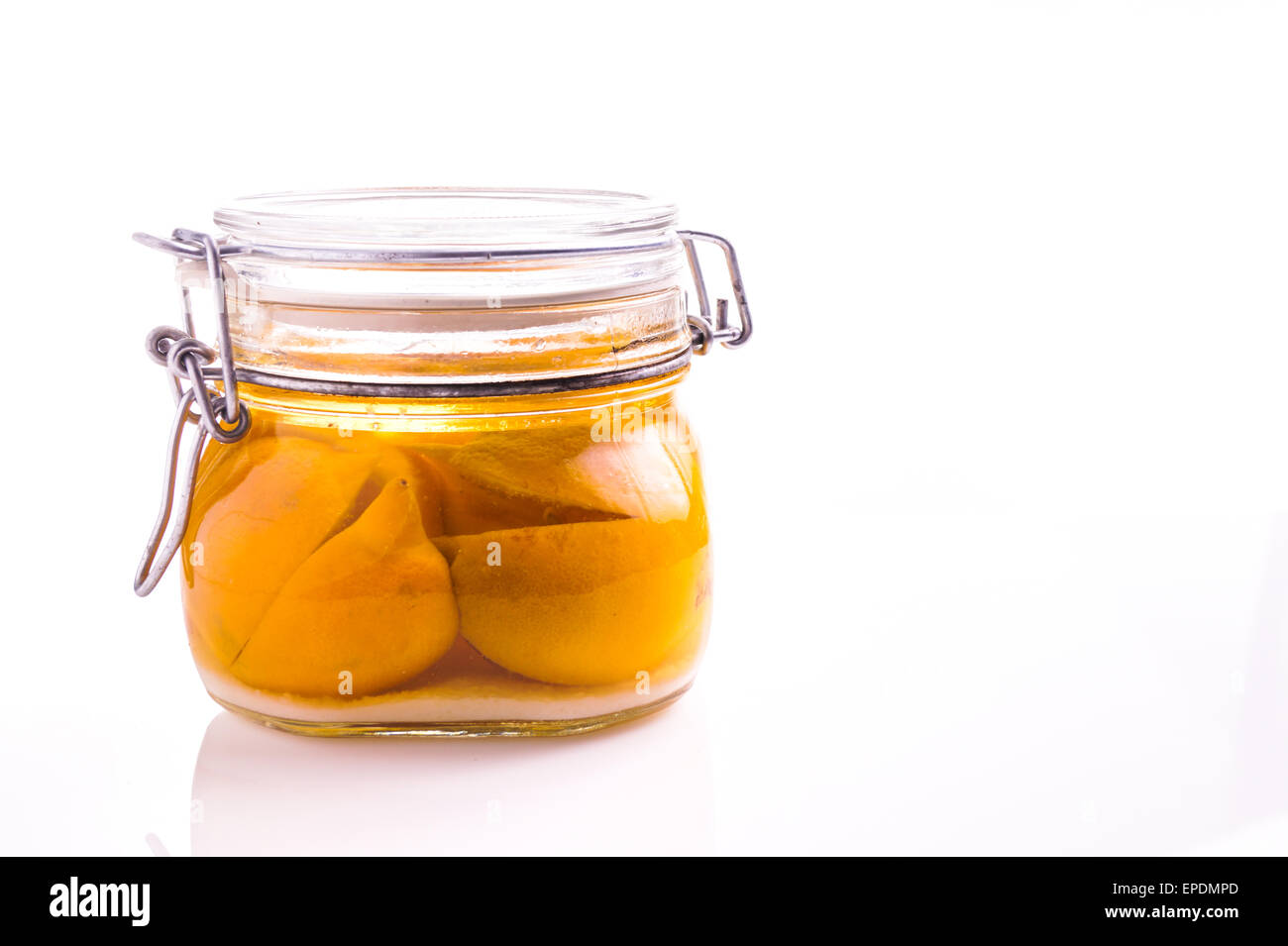 Preserved and Pickled lemon isolated on white Stock Photo - Alamy