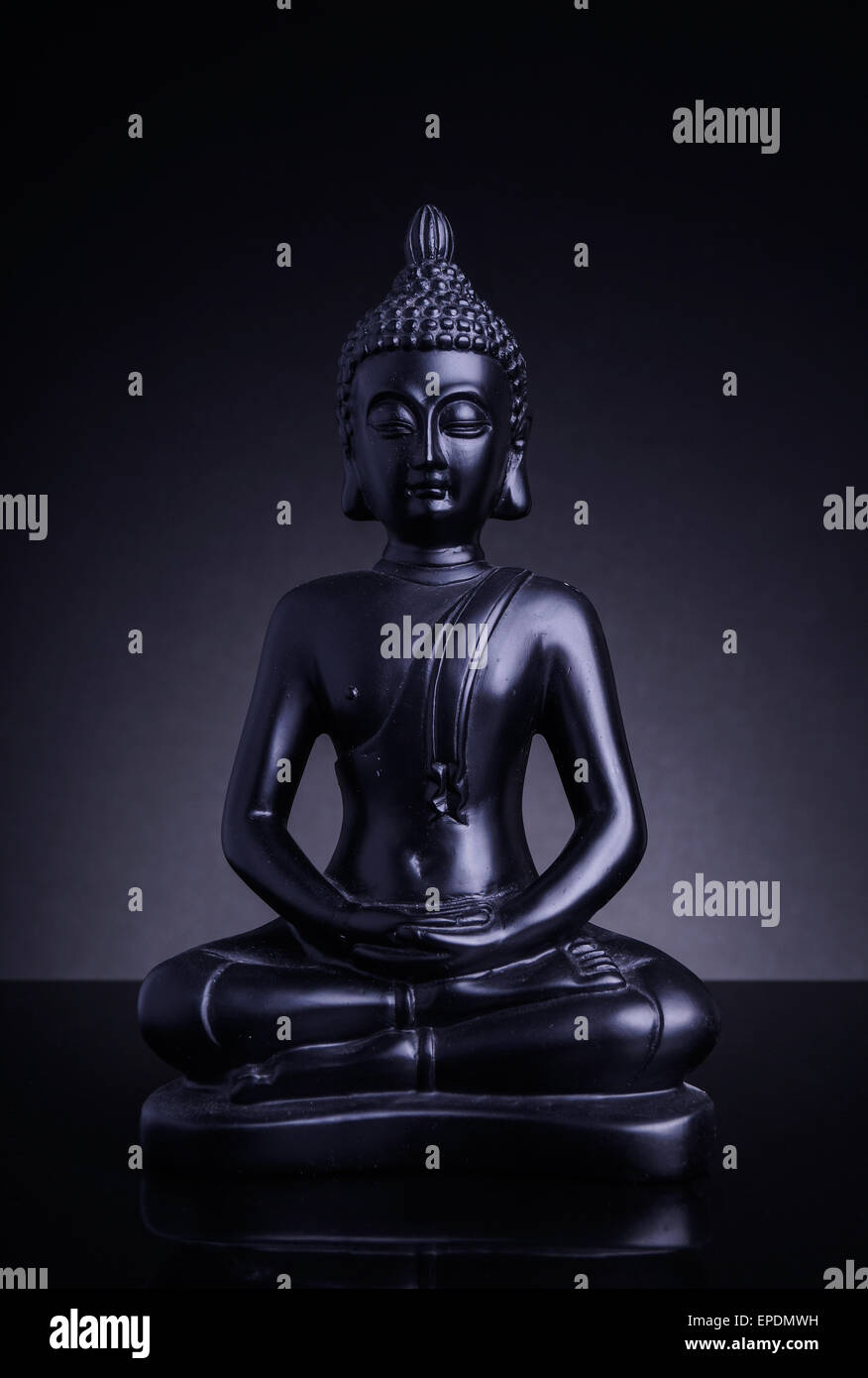 Statue of the Buddah with grey backlight Stock Photo - Alamy