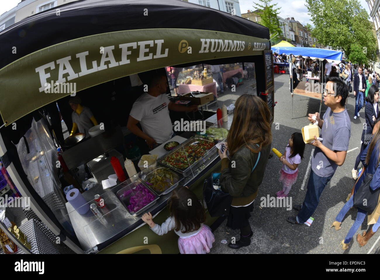 At the Primrose Hill festival Stock Photo - Alamy