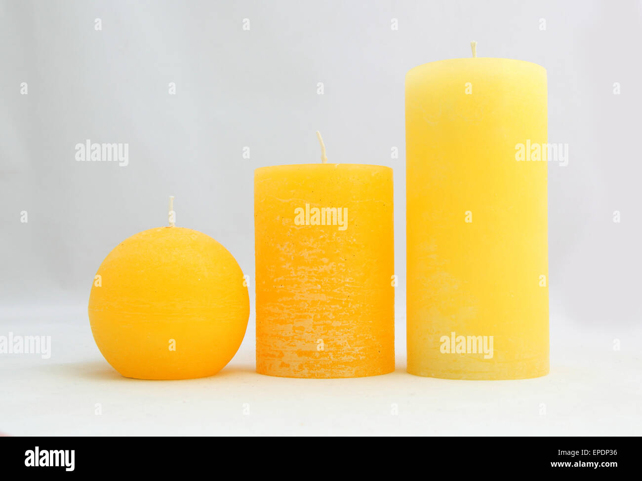 Gold yellow candles hi-res stock photography and images - Alamy