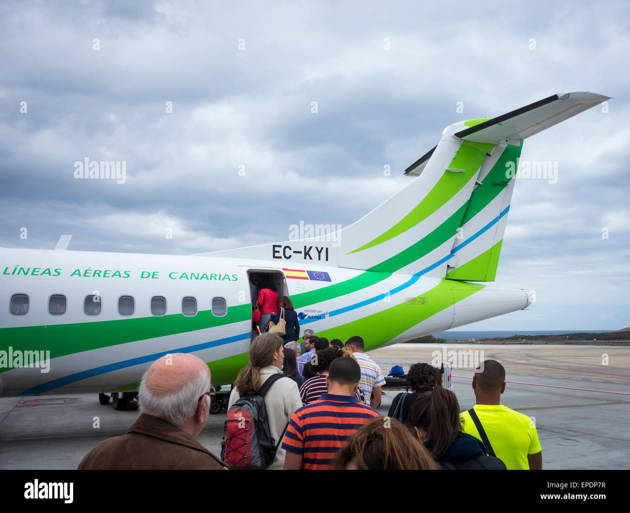 Passengers boarding inter-island flight on Binter airlines flight at ...