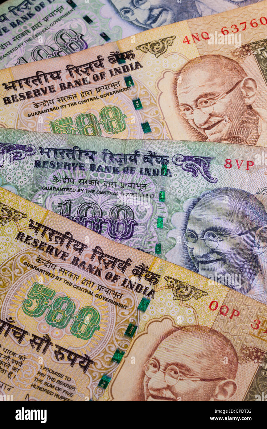 Different banknotes from India on the desk Stock Photo - Alamy