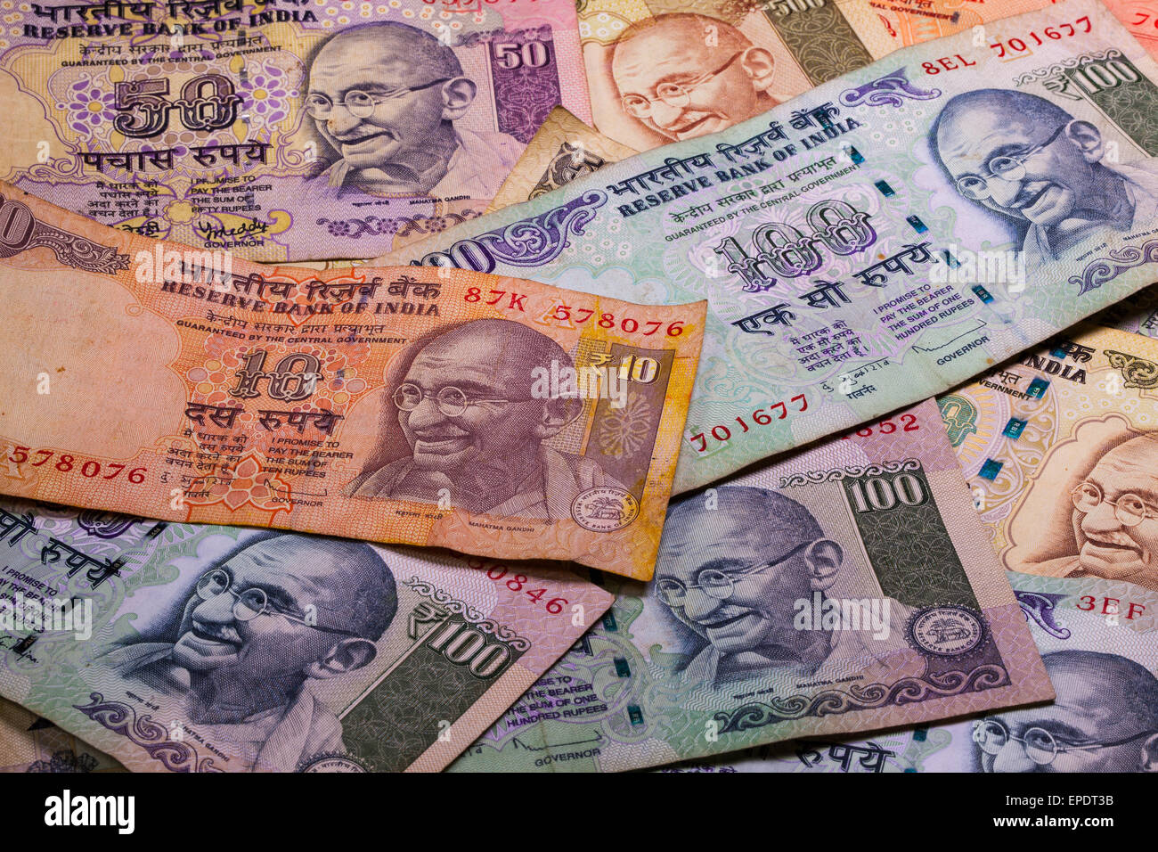 Different banknotes from India on the desk Stock Photo - Alamy