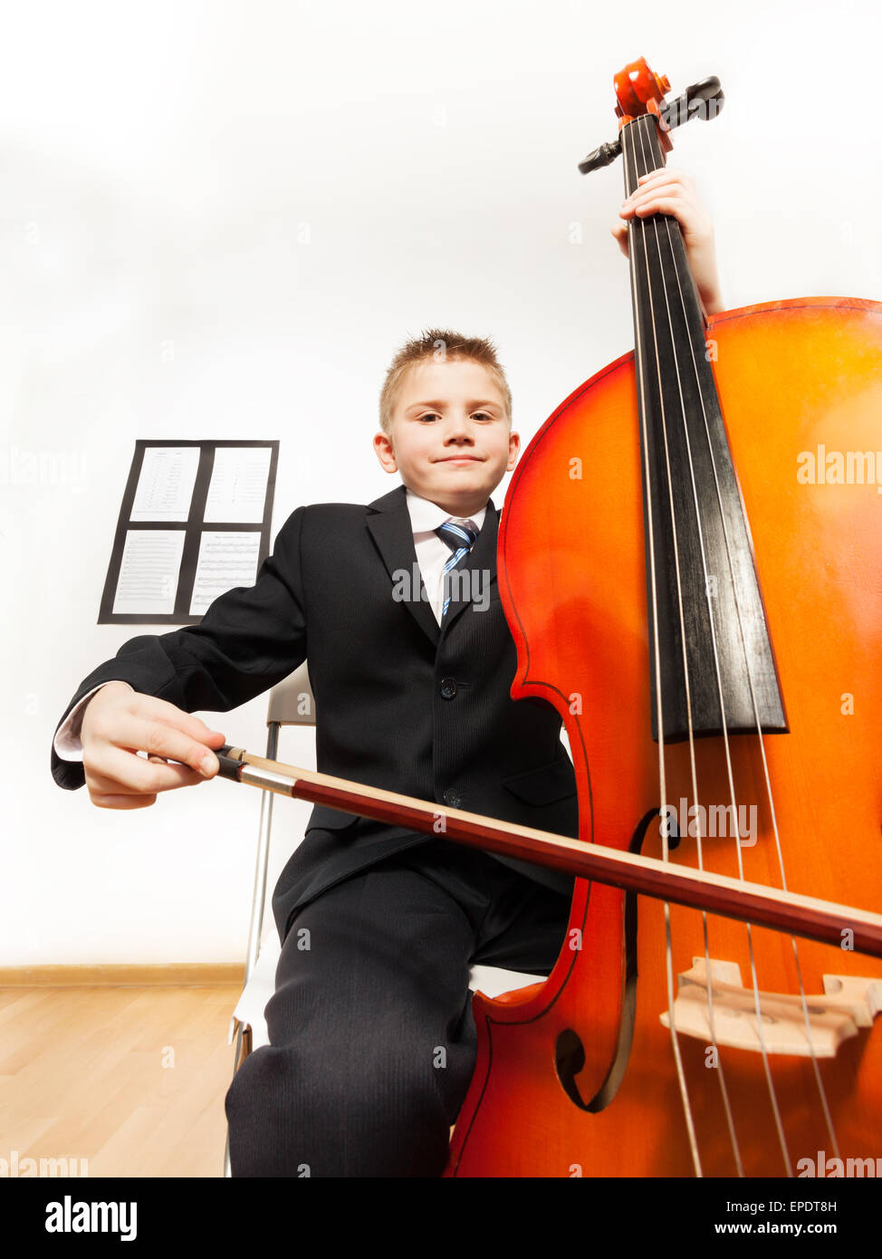 Boy playing cello violoncello hi-res stock photography and images - Alamy