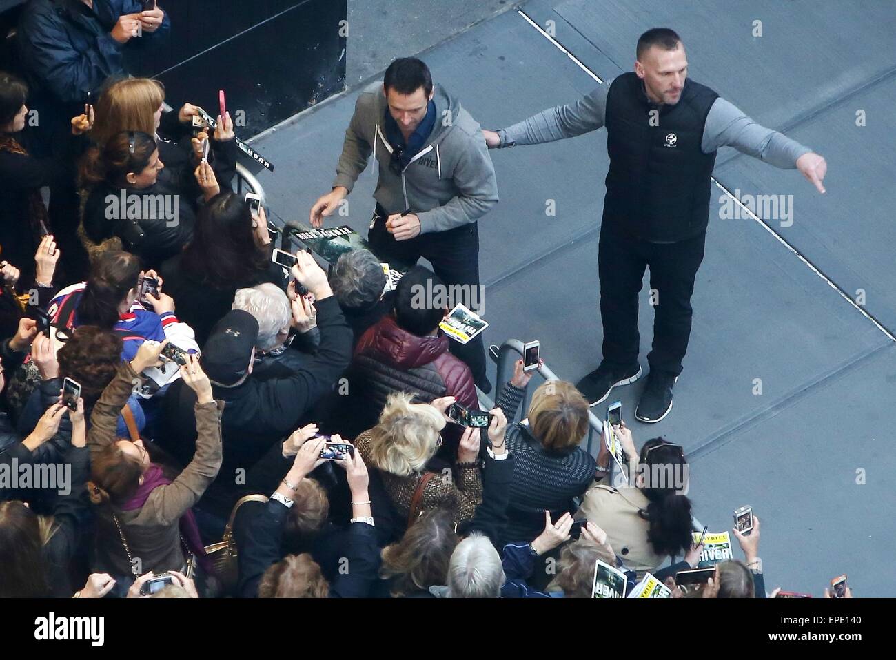 Hugh Jackman greets fans after the Broadway matinee of his new show ...