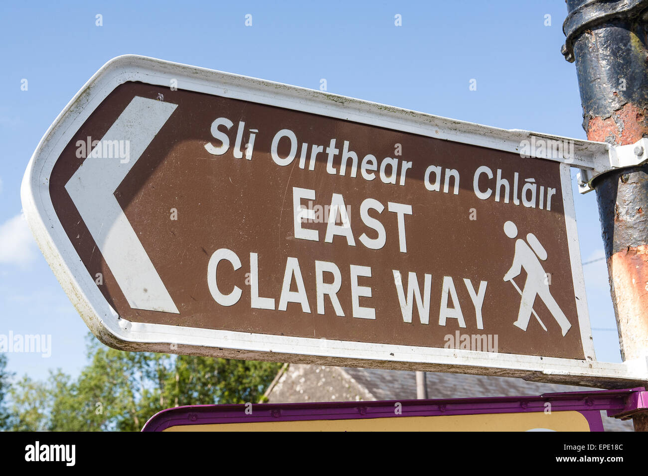 Signpost for East Clare Way footpath on High Street in this rural area ...