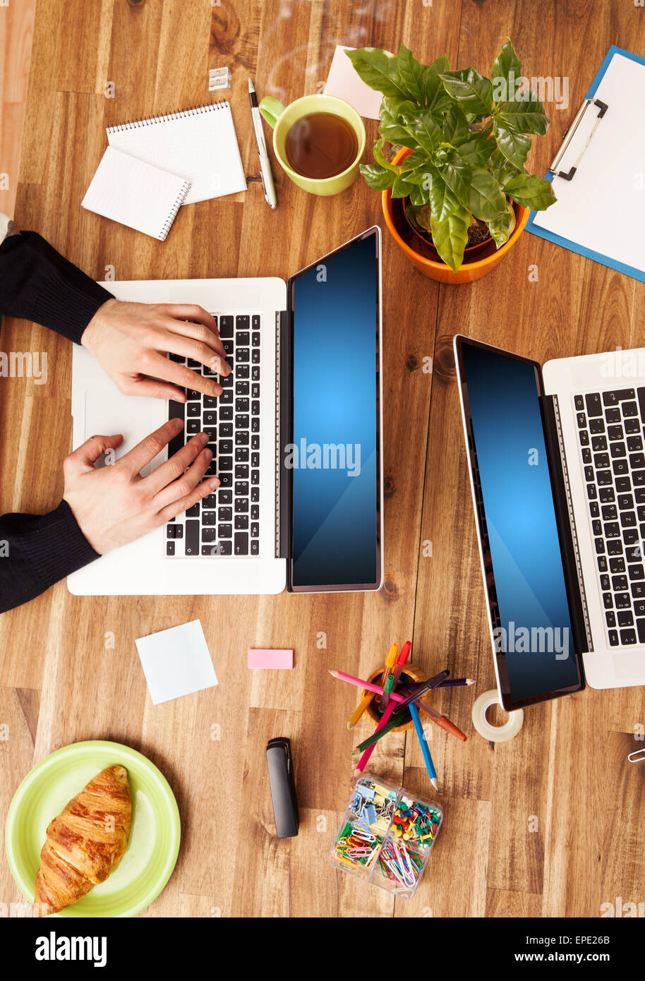 Group working with laptops hi-res stock photography and images - Alamy