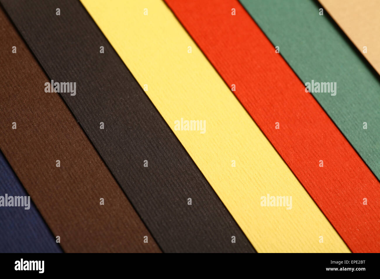 Vertical image of a multiple colored paper stripes Stock Photo - Alamy