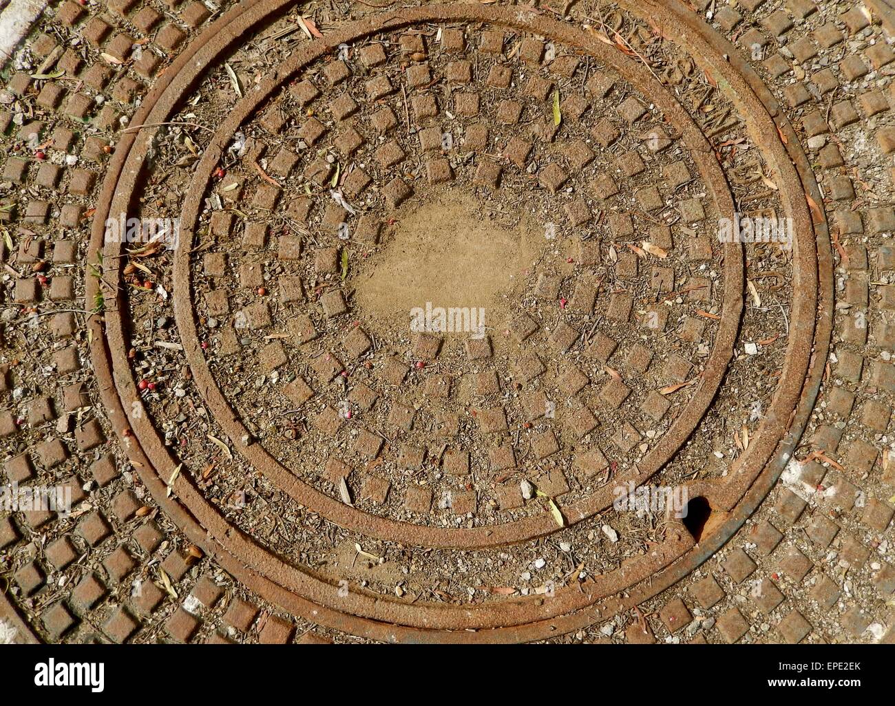 Rusty Manhole Cover Stock Photo - Alamy