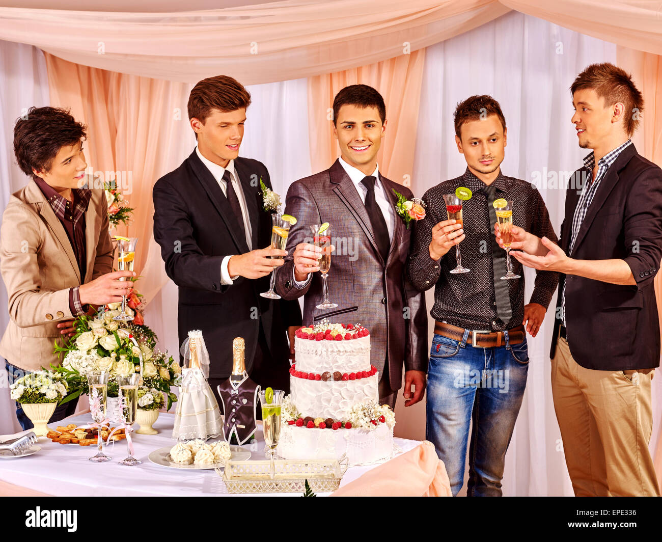 Group men at stage party Stock Photo - Alamy