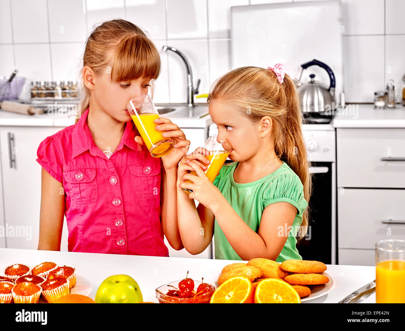 Children breakfast at kitchen Stock Photo - Alamy
