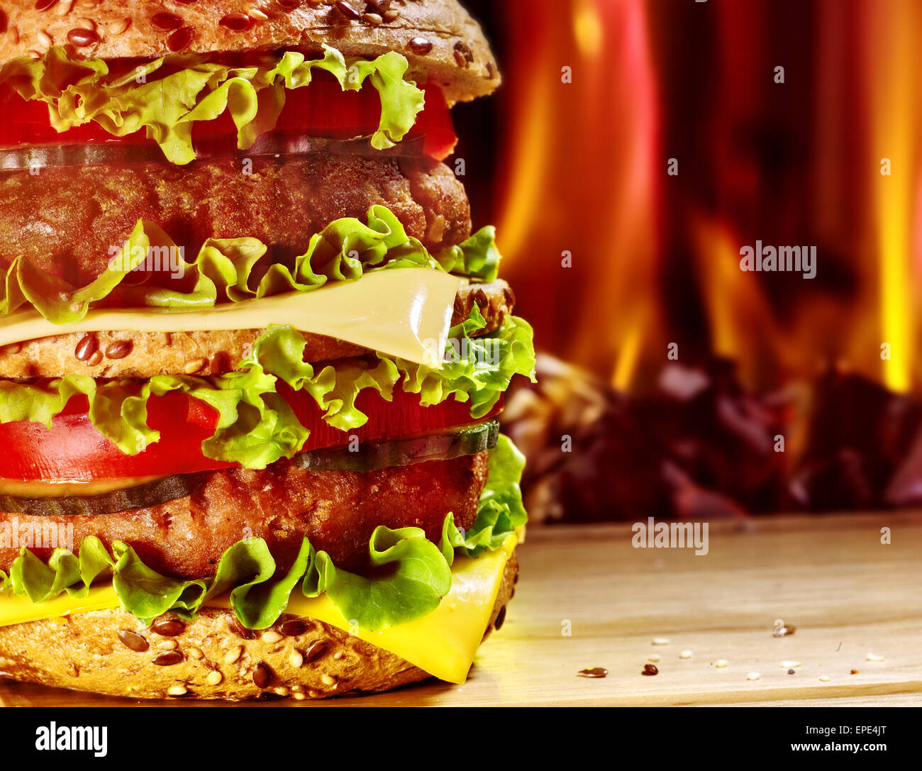 Hamburger fire flame cheeseburger hi-res stock photography and images ...