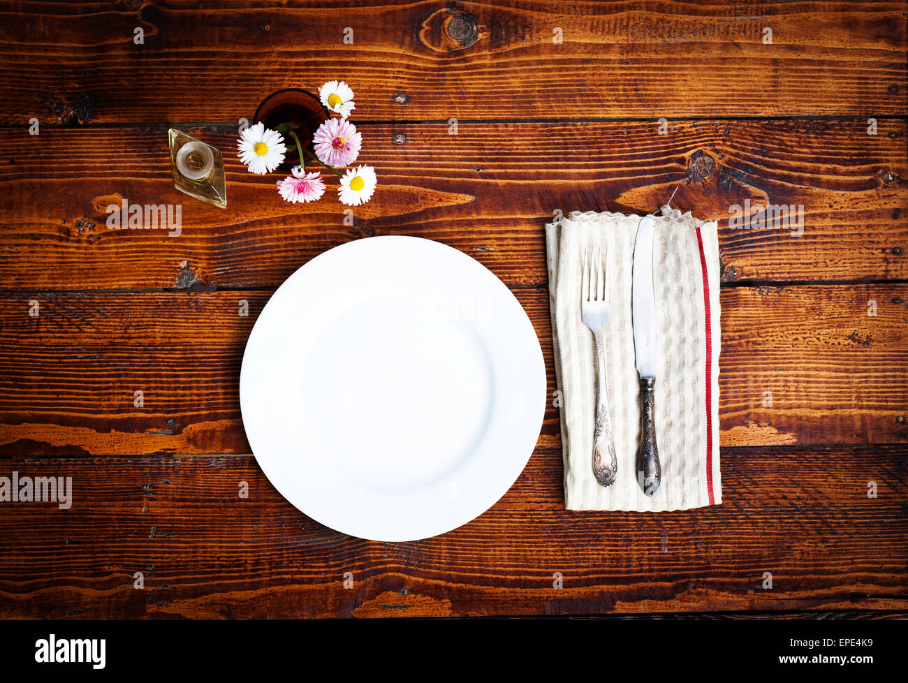 Table setting for two with empty plates - rustic wooden table Stock ...