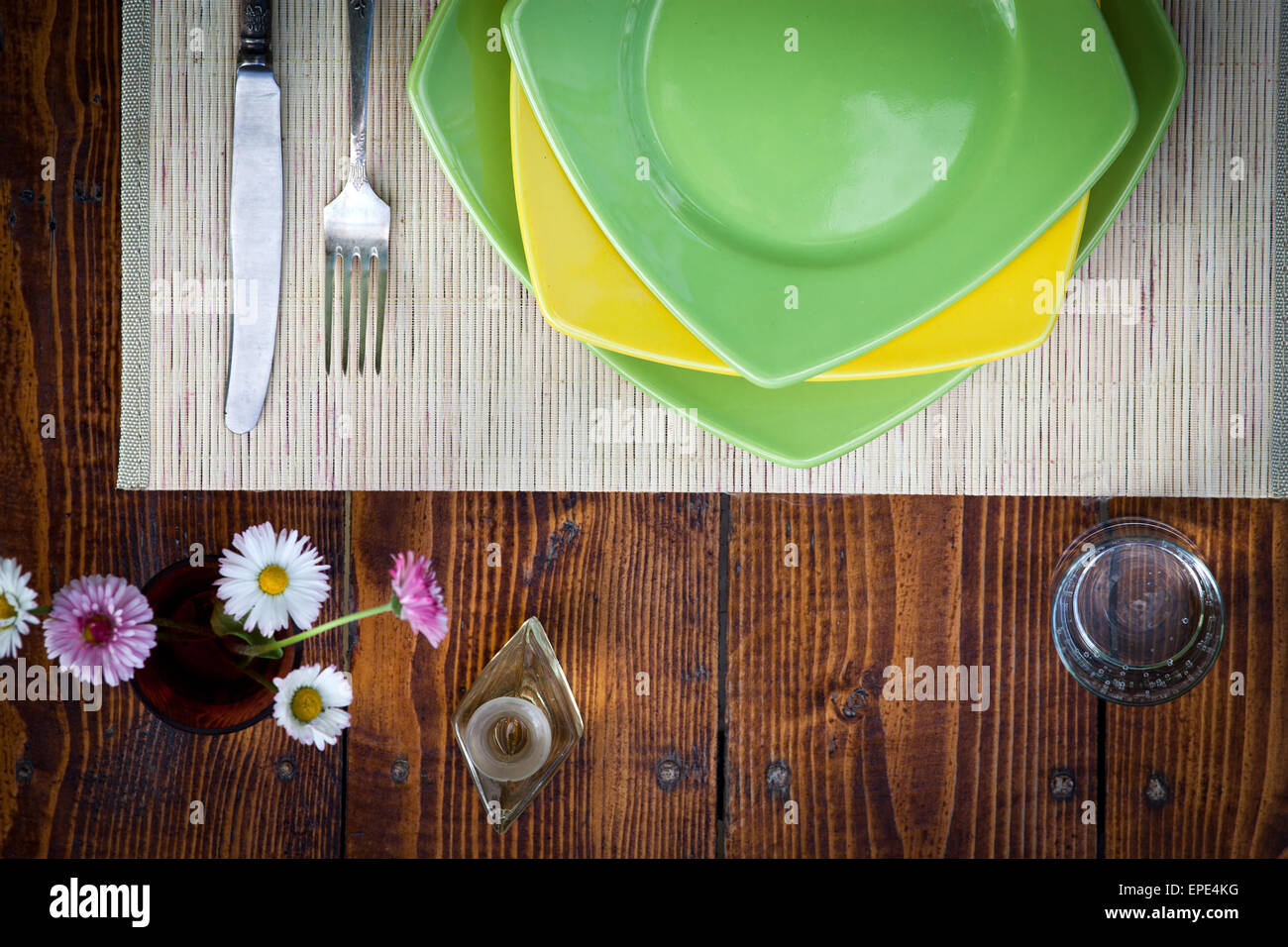 Table setting for two with empty plates - rustic wooden table Stock ...