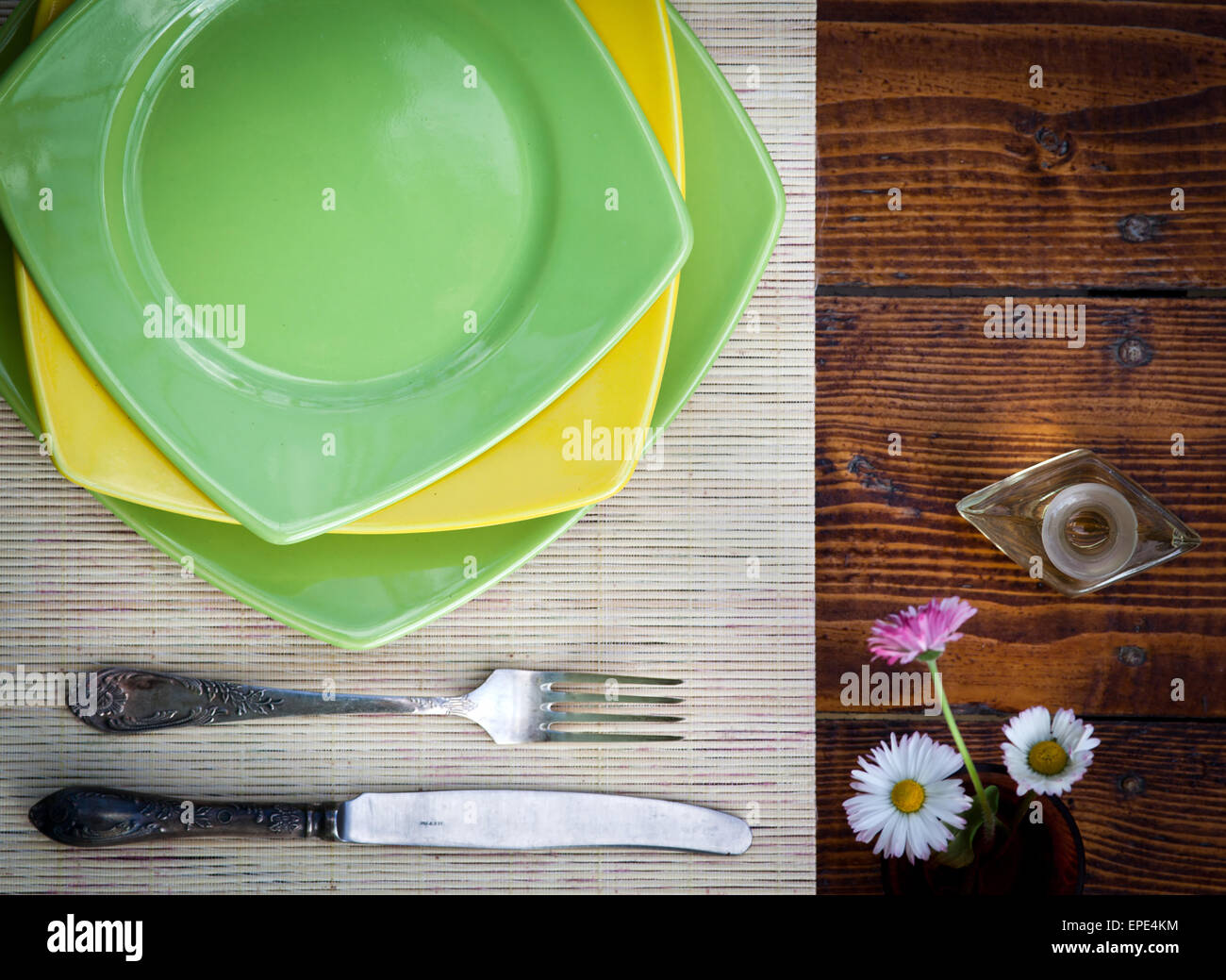 Table setting for two with empty plates - rustic wooden table Stock ...