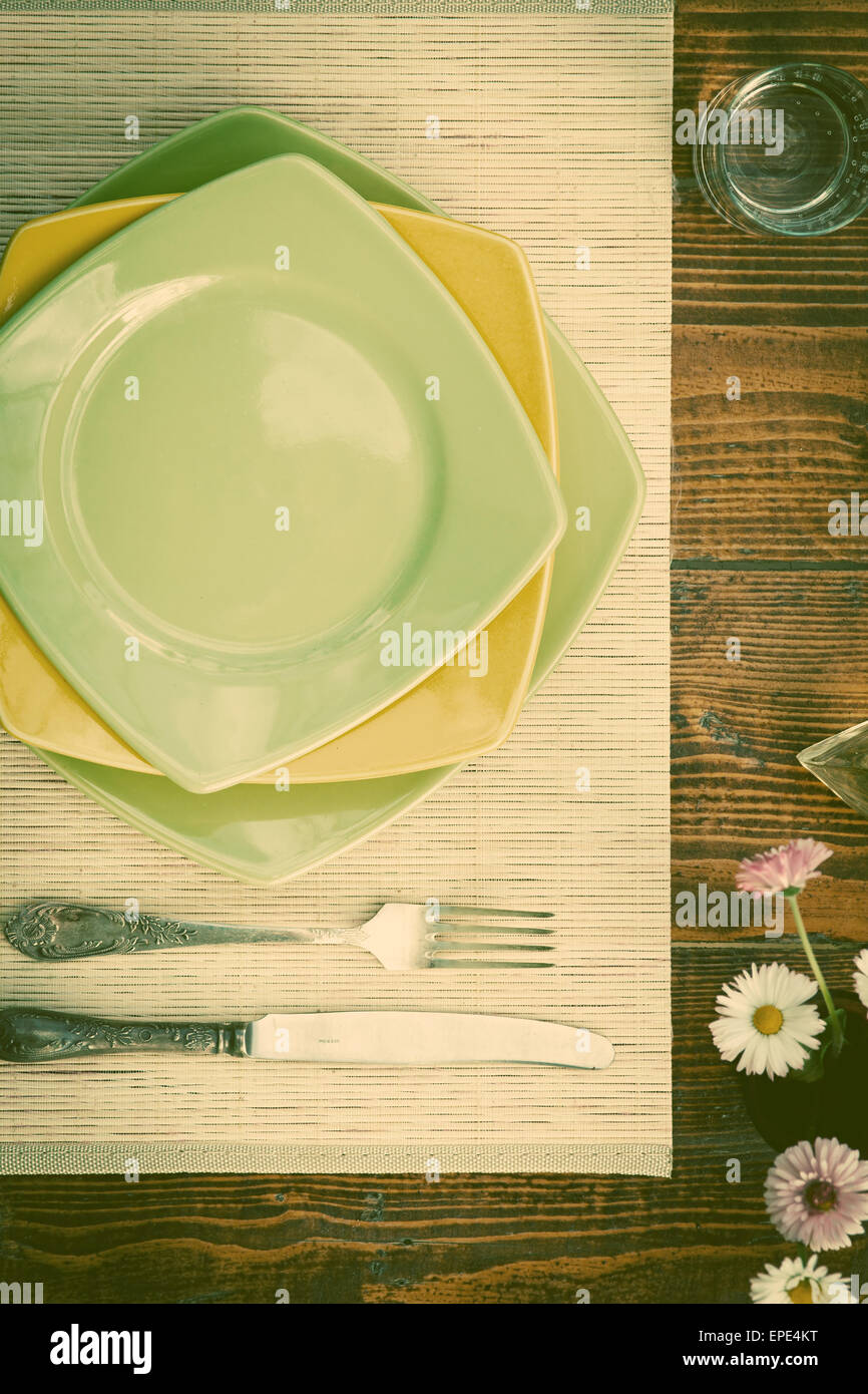 Table setting for two with empty plates - rustic wooden table Stock ...