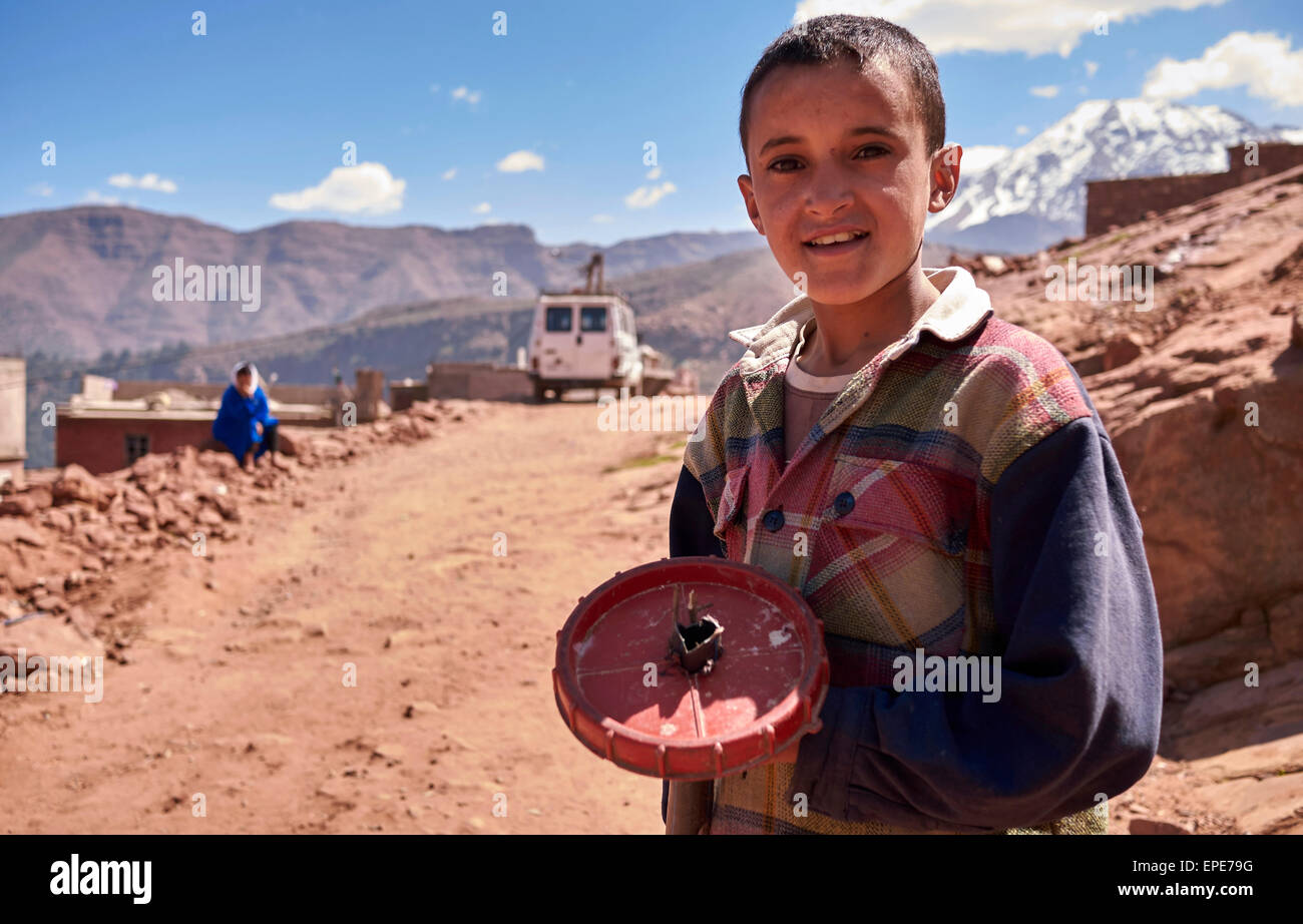 Berber boy with a toy in the atlas mountains Morocco Stock Photo - Alamy