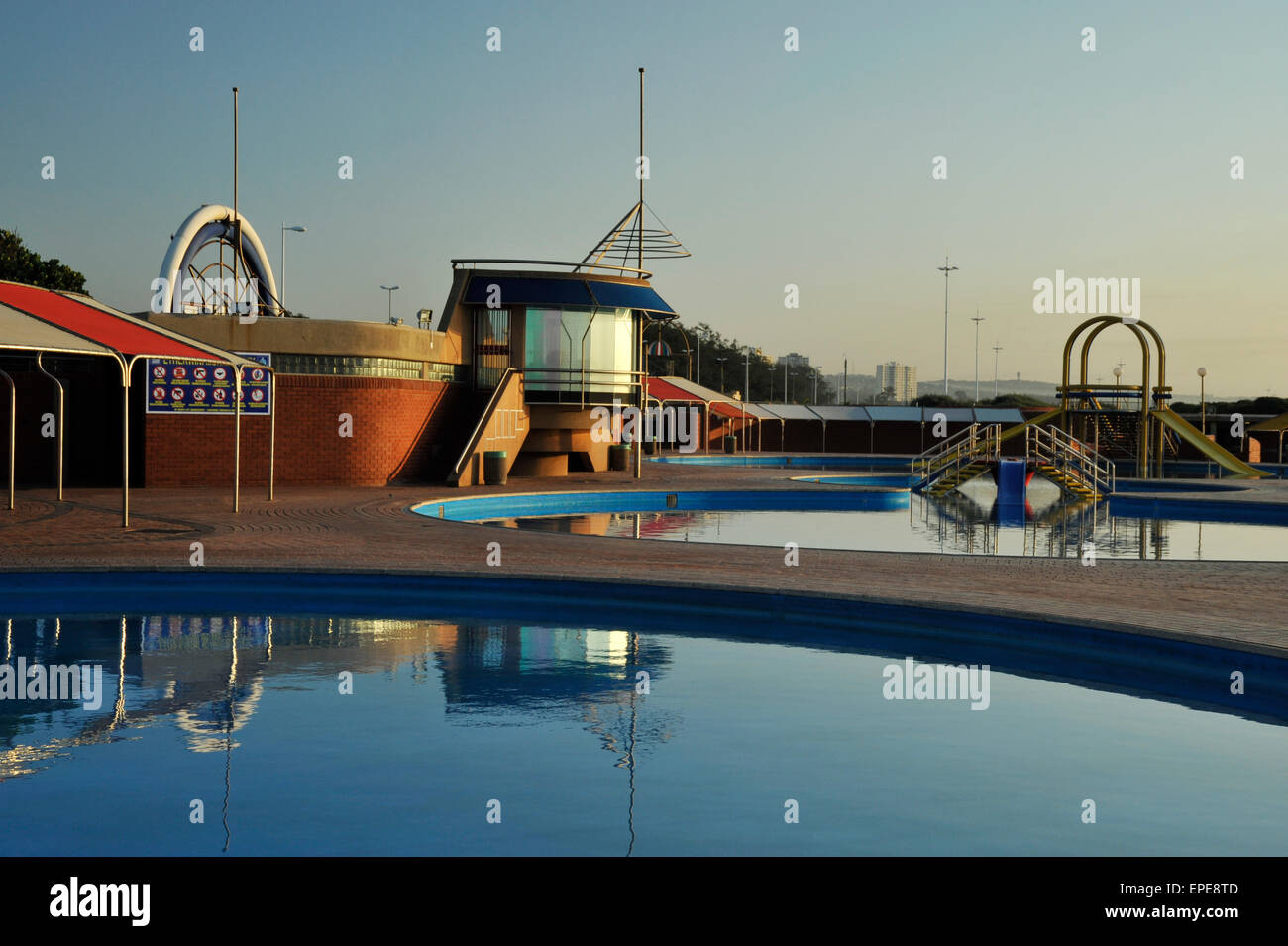 Early morning reflections of buildings in swimming pools at Laguna ...