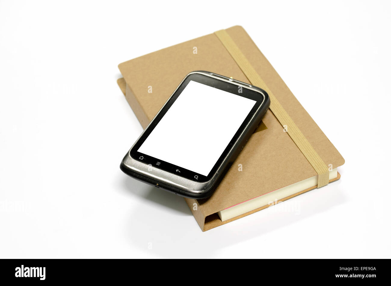 used smartphone with note book on a white background Stock Photo - Alamy