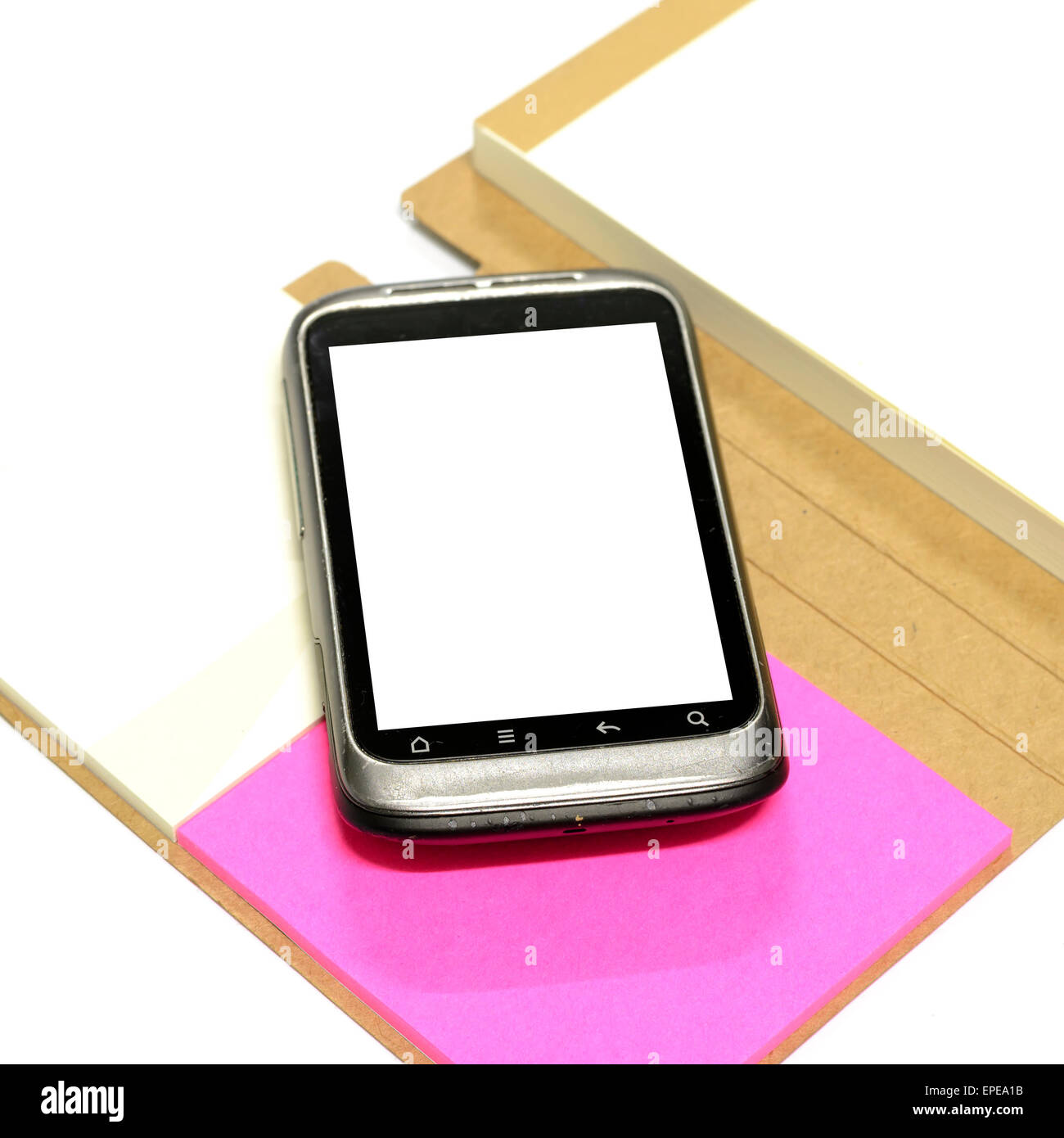 used smartphone with note book on a white background Stock Photo - Alamy