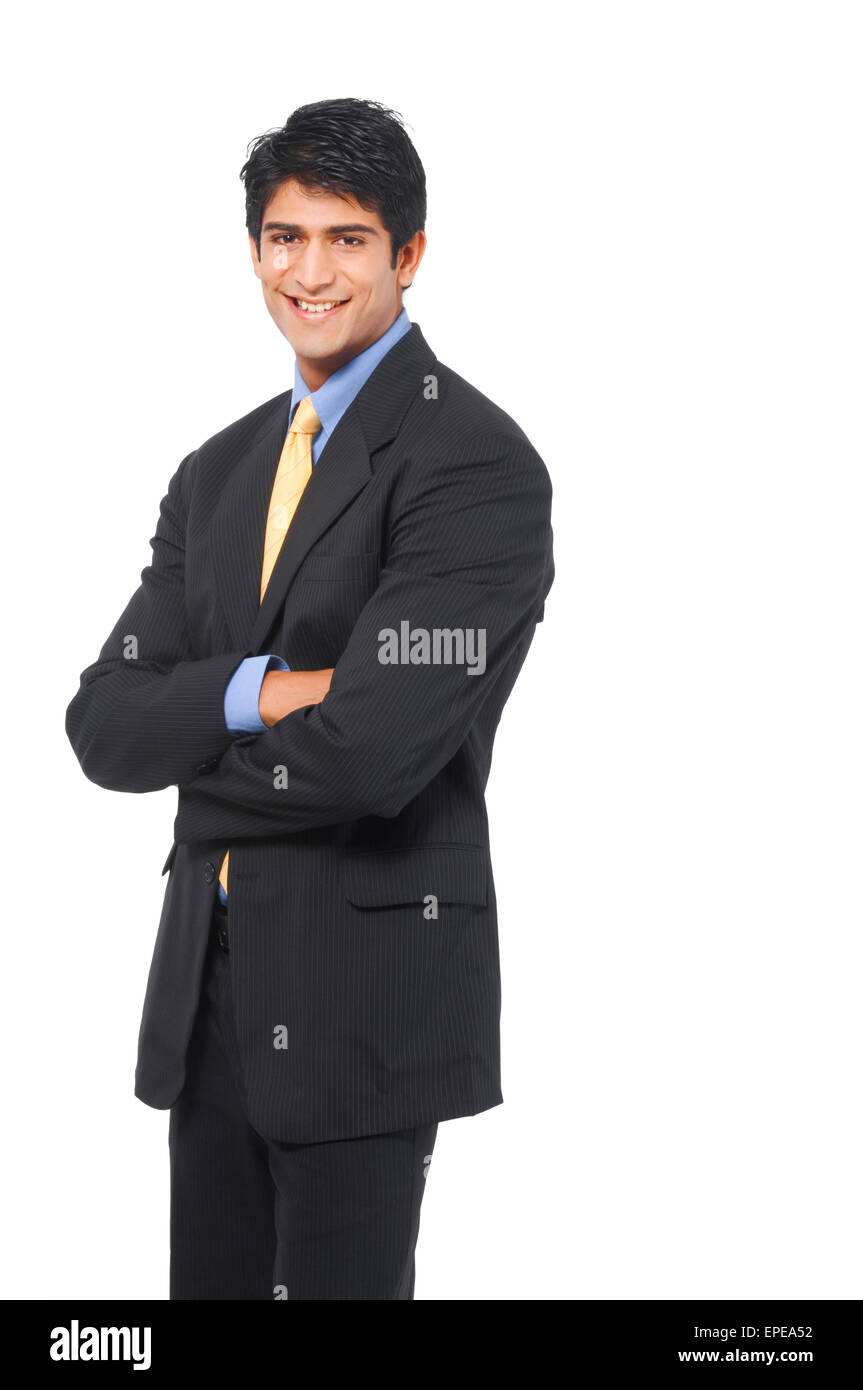 One businessman standing with hands folded Stock Photo - Alamy