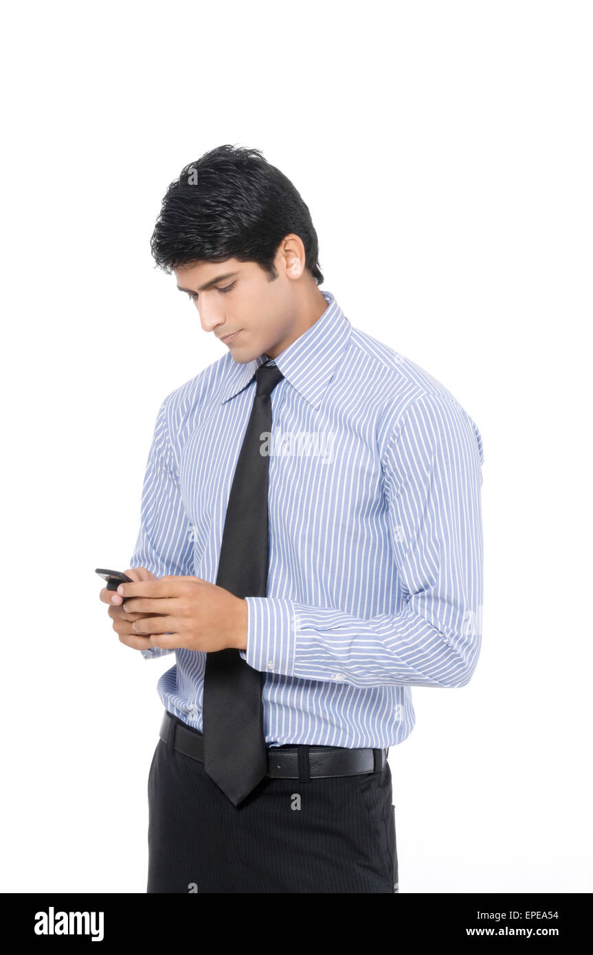 One businessman standing with a mobile phone Stock Photo - Alamy