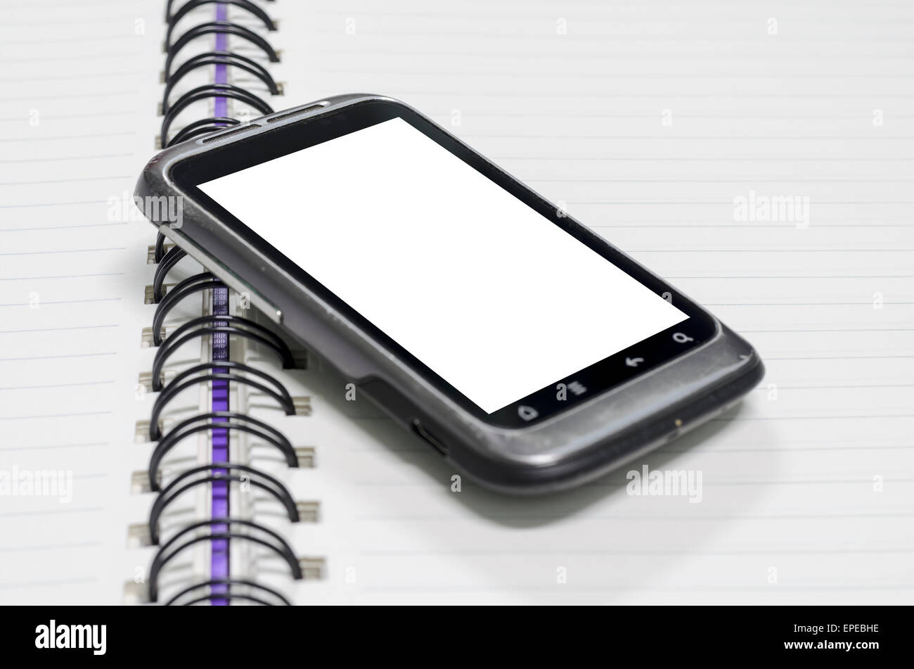 used smartphone with note book Stock Photo - Alamy