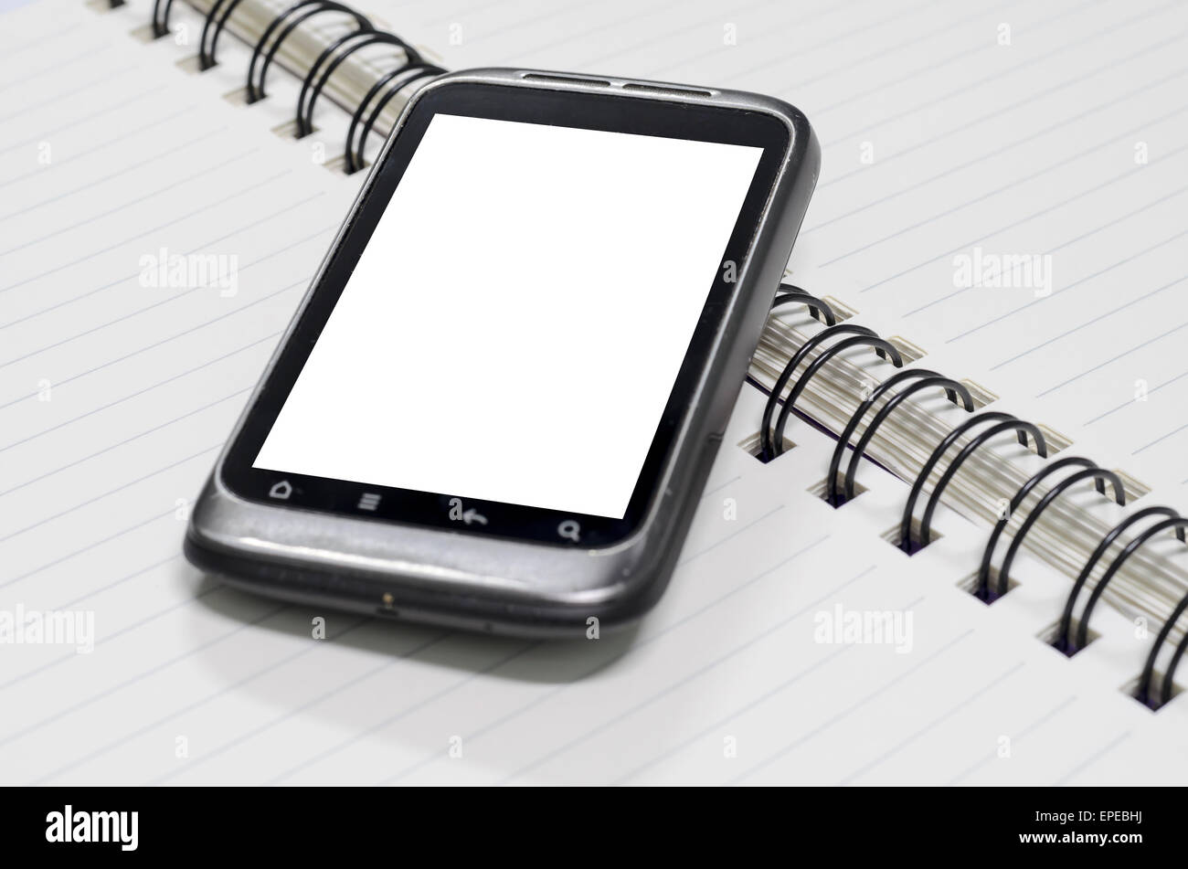 used smartphone with note book Stock Photo - Alamy