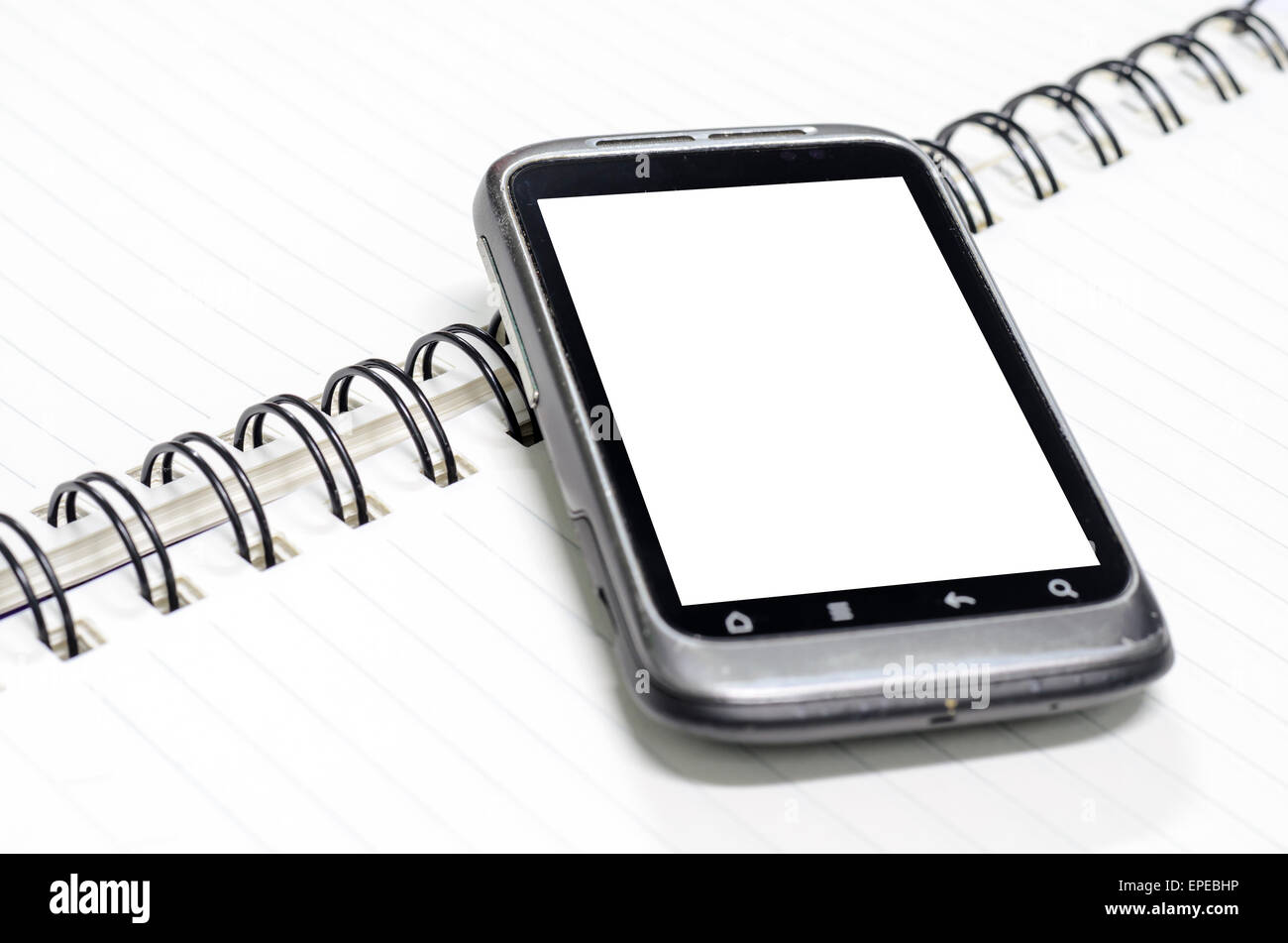used smartphone with note book Stock Photo - Alamy