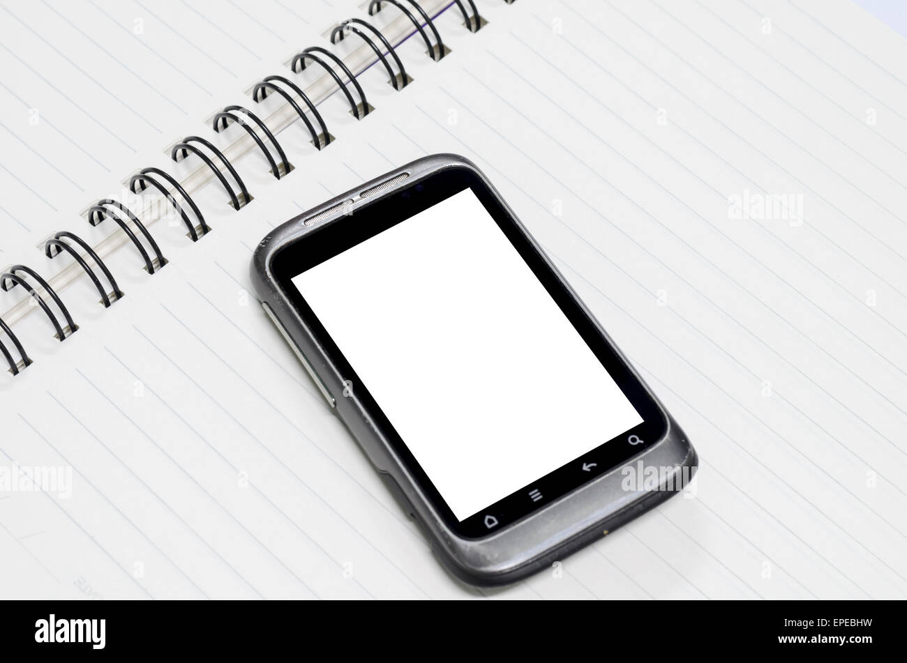 used smartphone with note book Stock Photo - Alamy