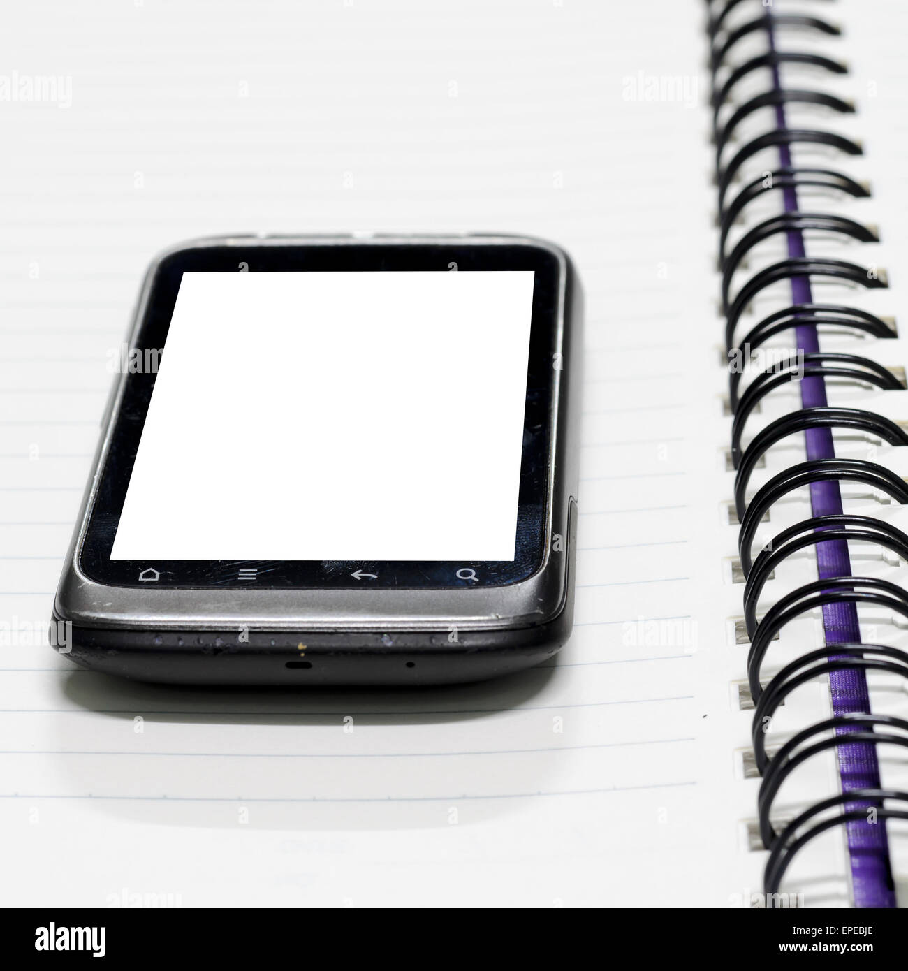 used smartphone with note book Stock Photo - Alamy