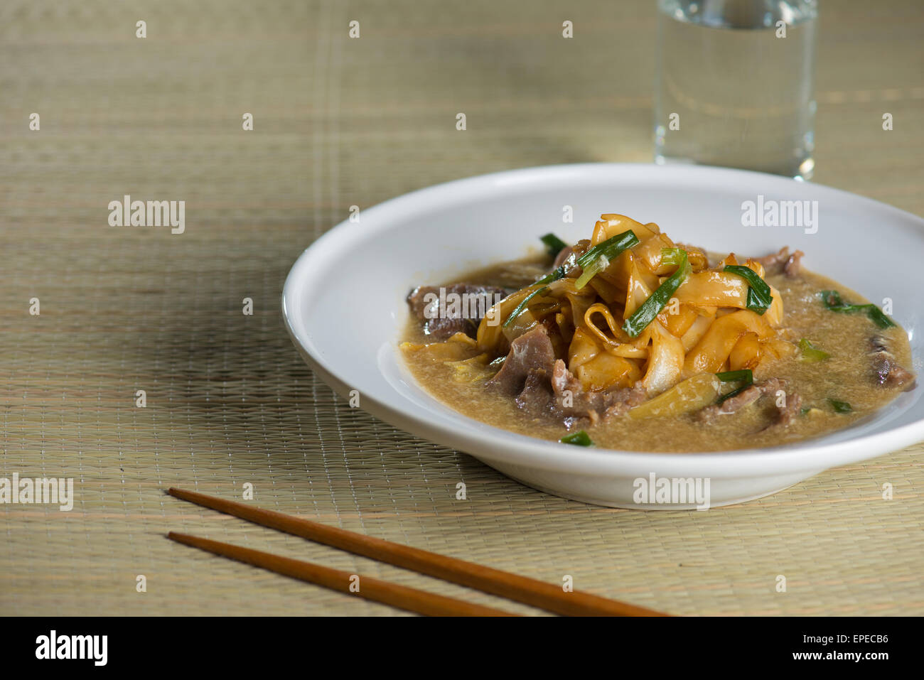 wat tan hor, popular cantonese fried noodle with beef Stock Photo - Alamy