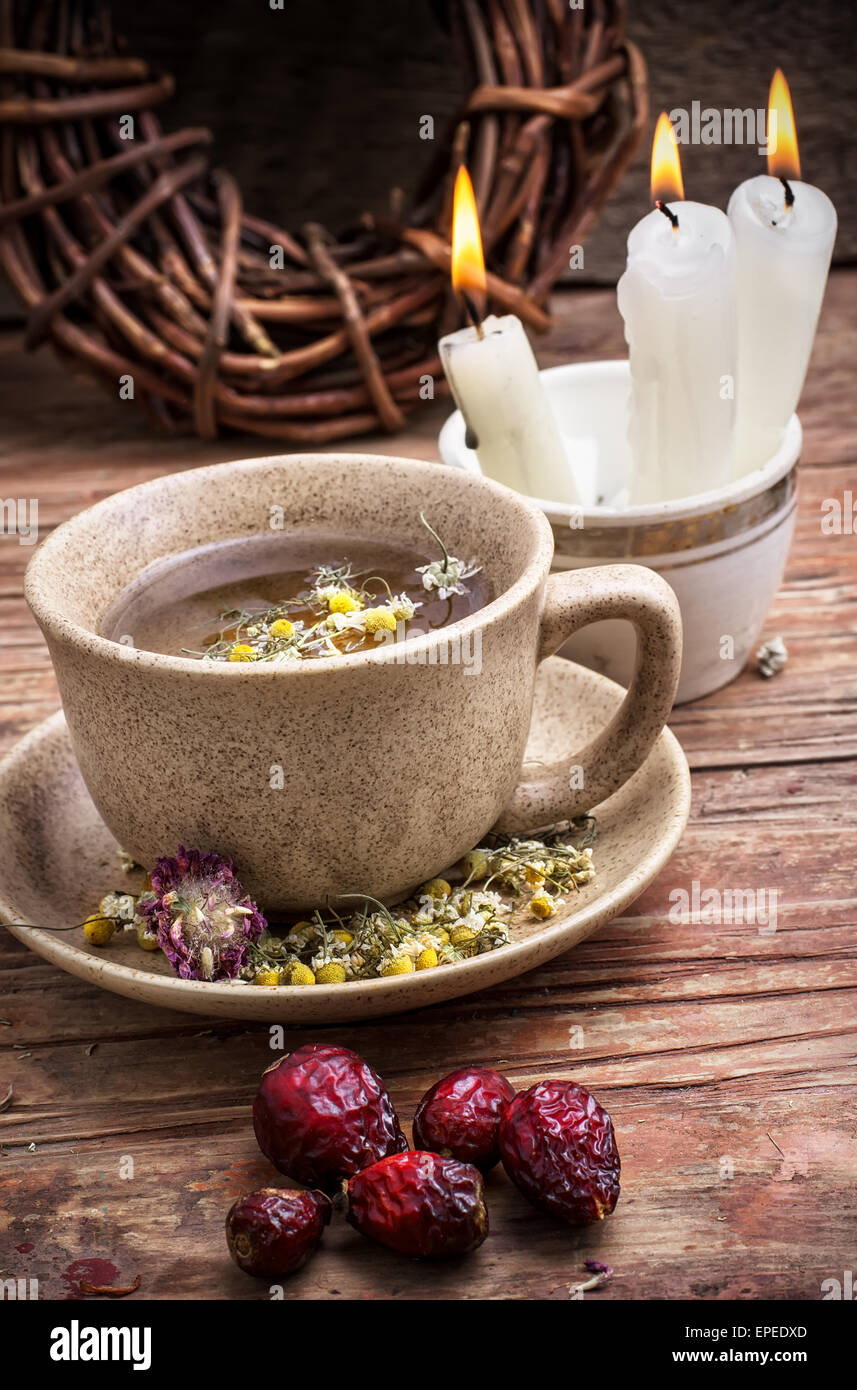 fragrant chamomile tea and briar in rustic style Stock Photo - Alamy