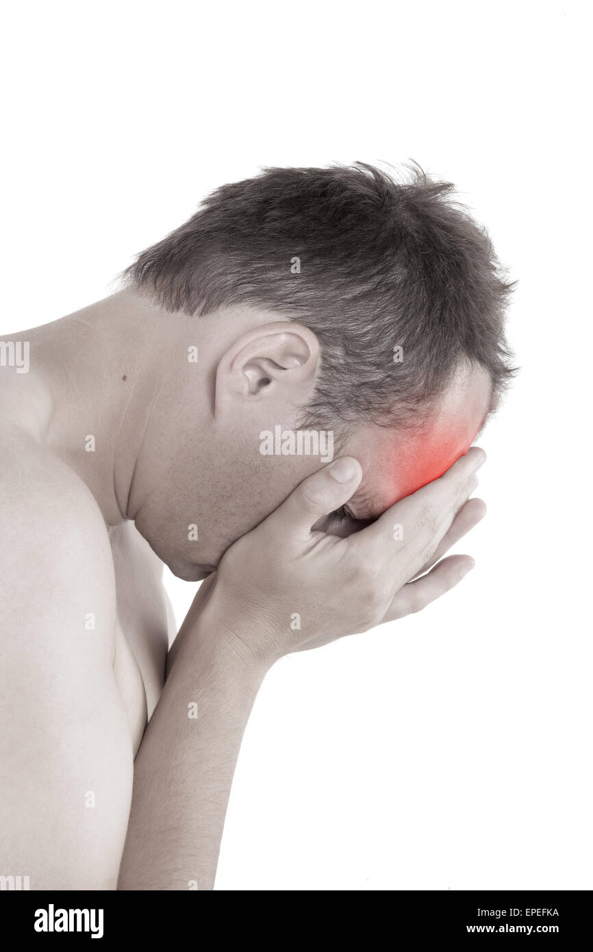 Migraine and headache. Young man touching his head isolated on white ...