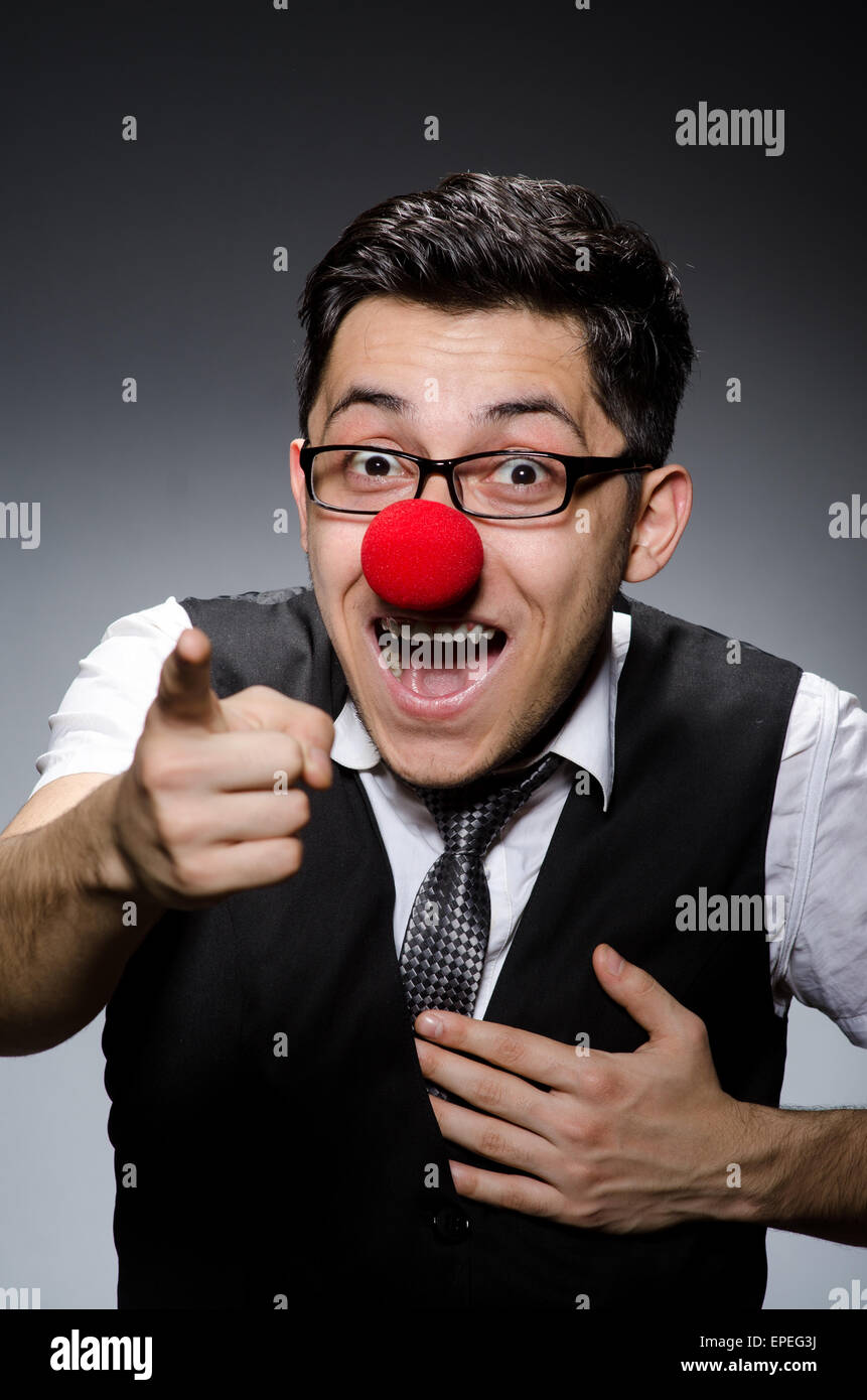 Funny businessman with clown nose Stock Photo - Alamy