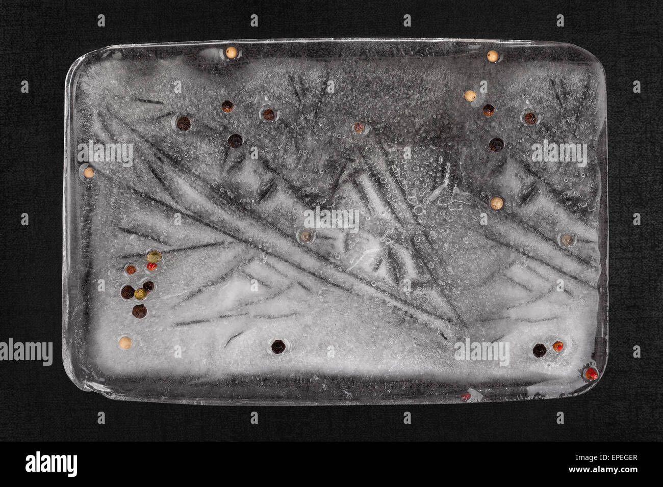 Frozen ice block isolated on black background. Fresh gastronomy ...