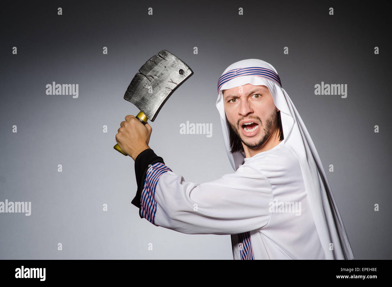 Arab man with sharp axe Stock Photo - Alamy