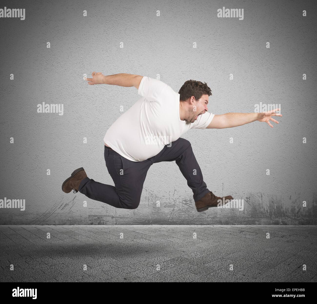 Fat man runs Stock Photo - Alamy