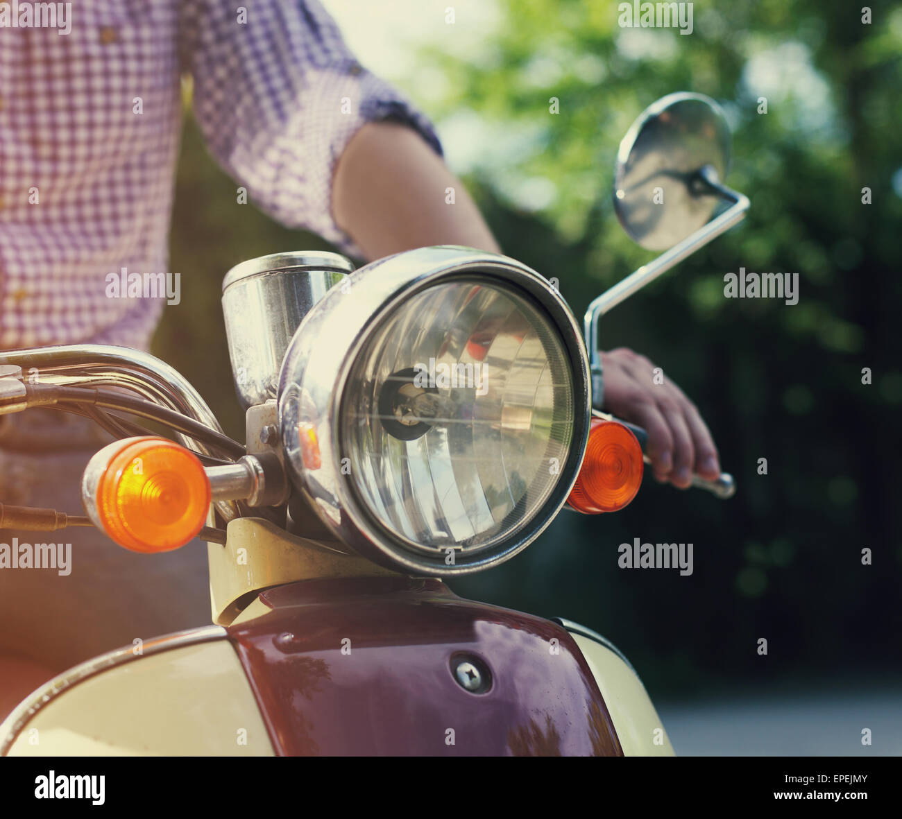 Old man riding scooter moped hi-res stock photography and images - Alamy