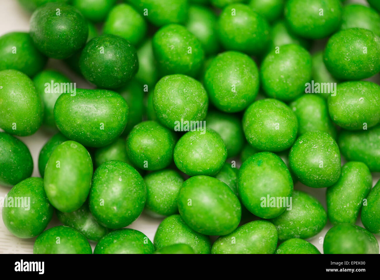 Green sweets as a background Stock Photo - Alamy