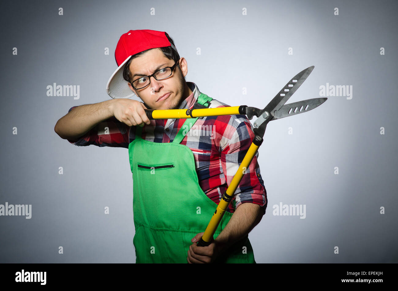 Funny man with giant shears Stock Photo - Alamy