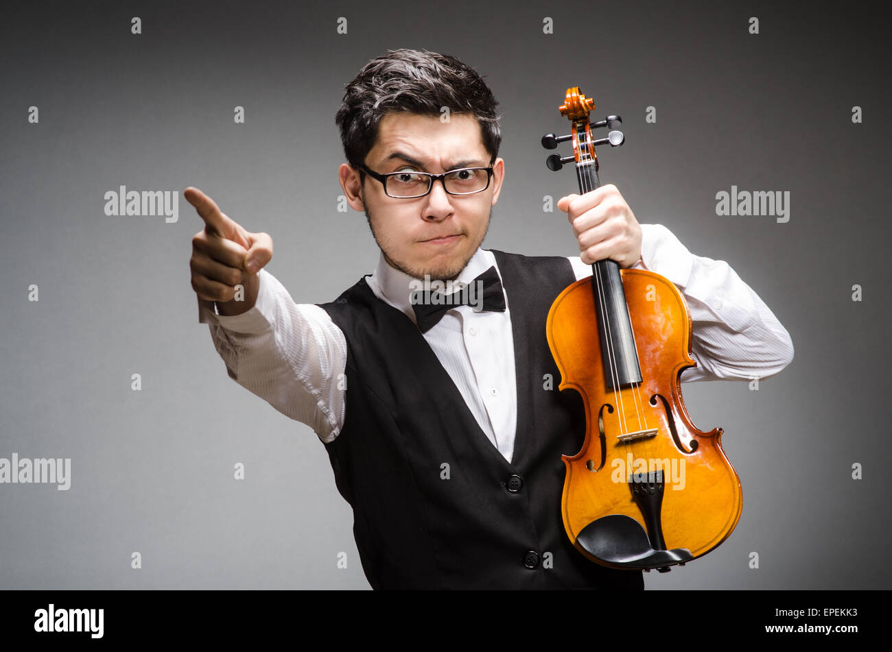 Funny violin player with fiddle Stock Photo - Alamy