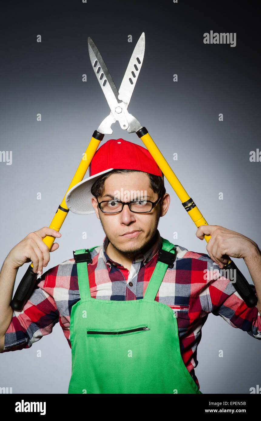 Funny man with giant shears Stock Photo - Alamy