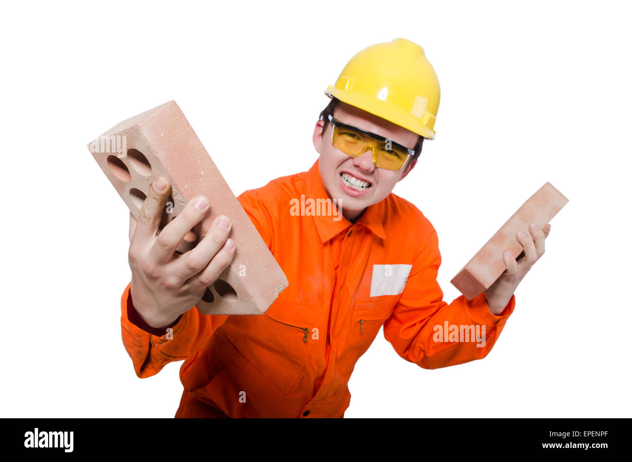 Man with brick isolated on white Stock Photo - Alamy