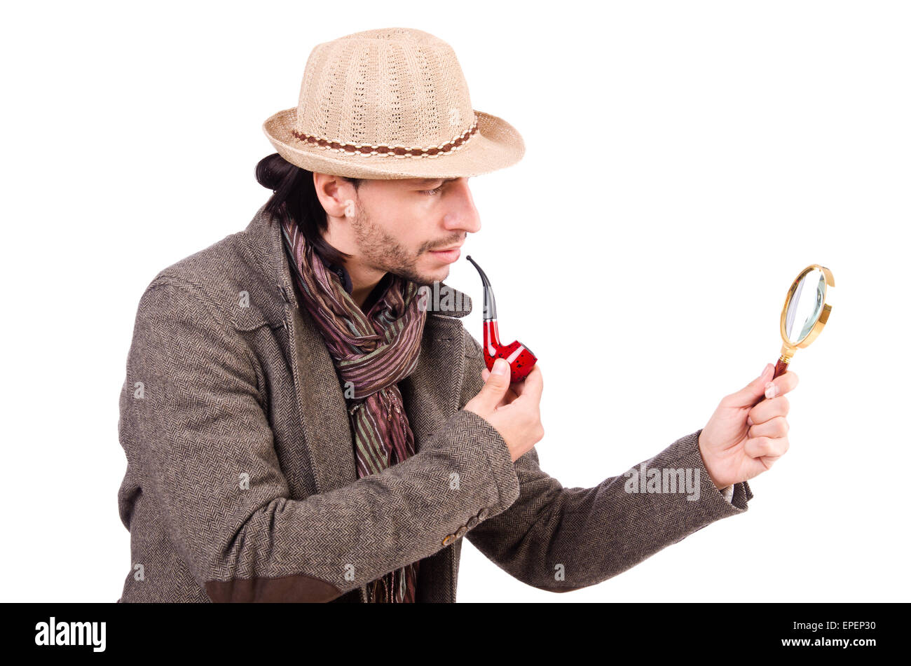 Young detective with pipe and magnifying glass Stock Photo - Alamy